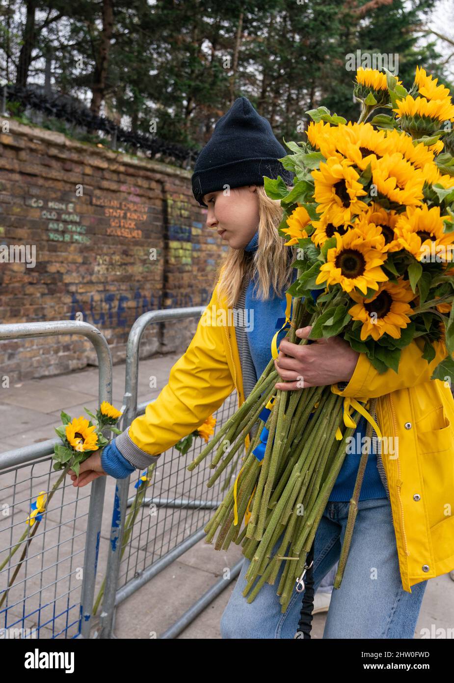 A group of people supporting the Sunflower of Peace charity ...