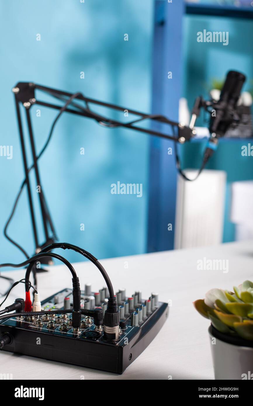 Professional audio mixer used for recording audio podcast on desk in ...