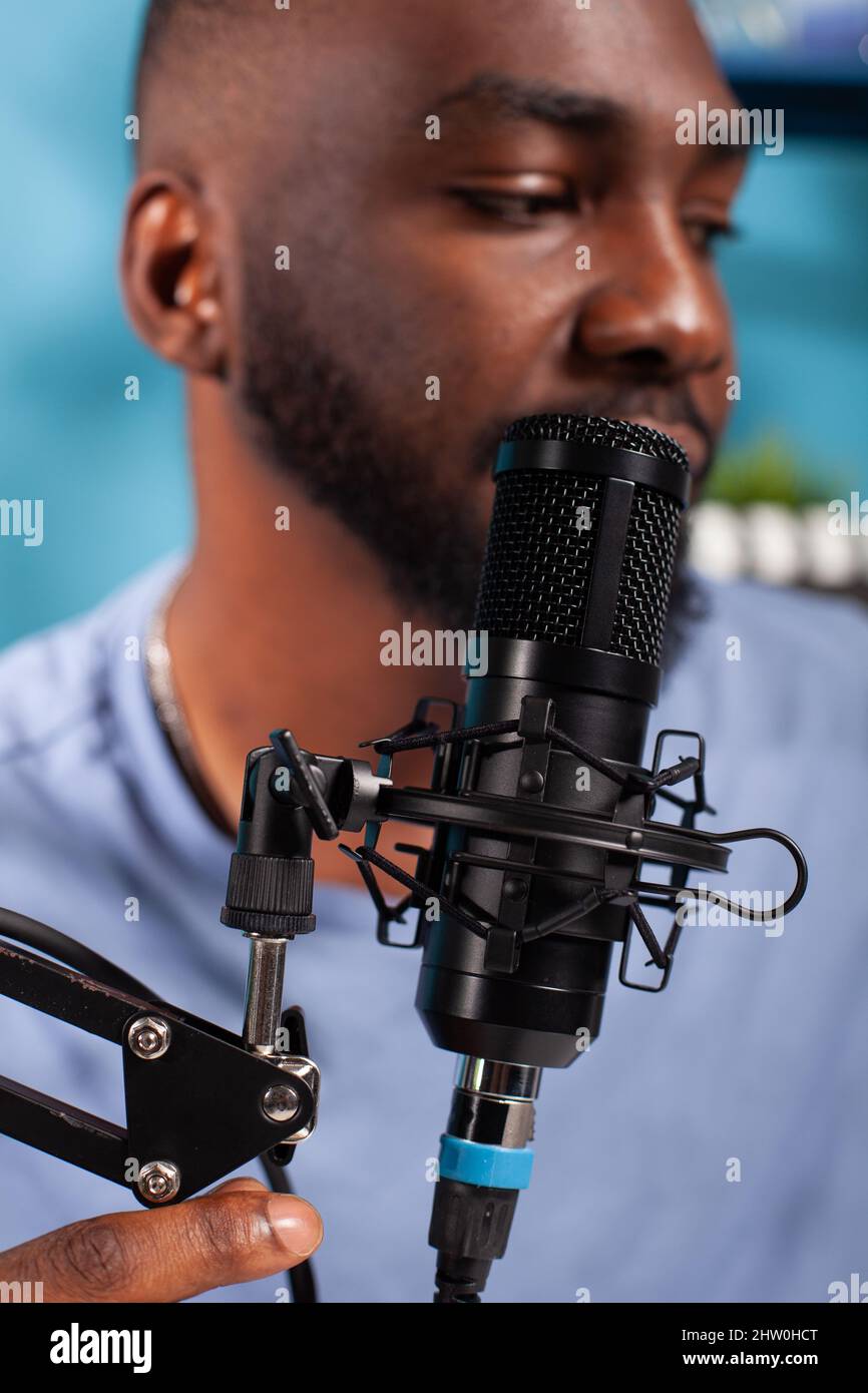 Closeup of professional microphone swivel boom arm stand in front of ...