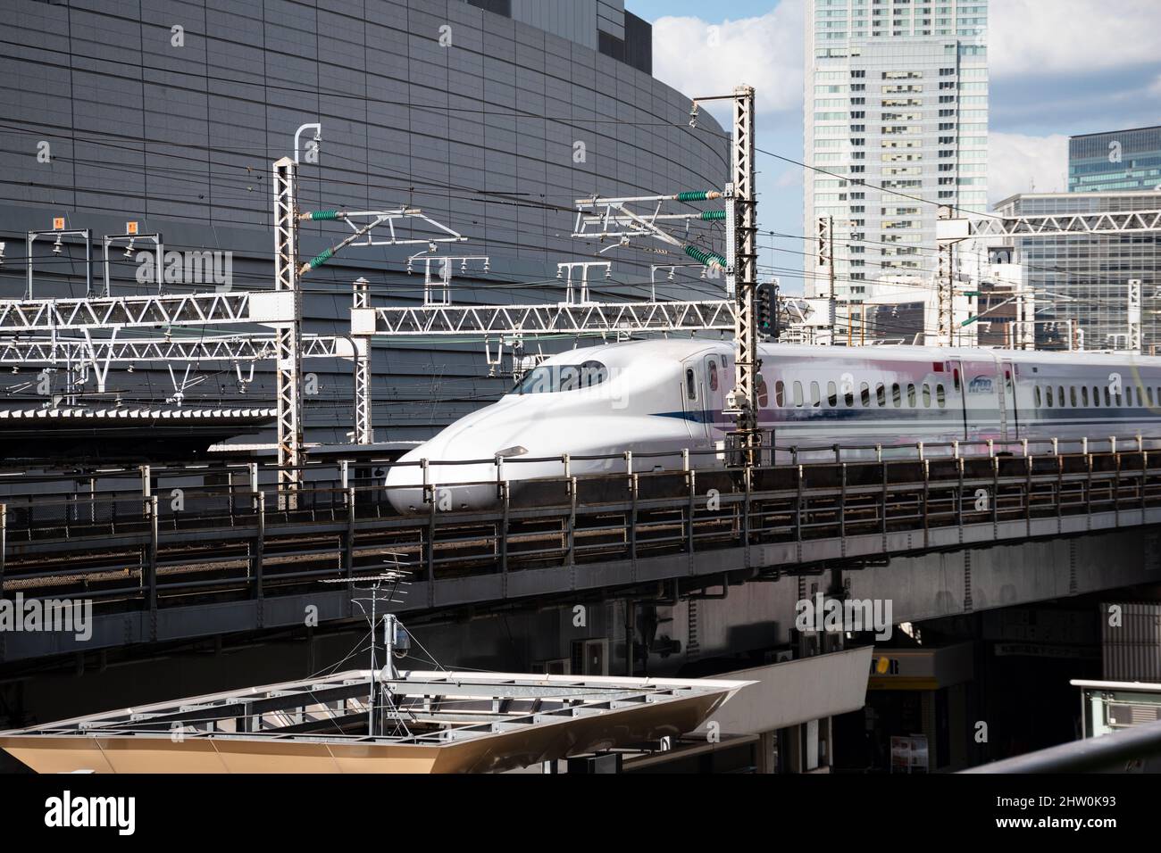 Motion view of Shinkansen bullet train through railway Stock Photo - Alamy