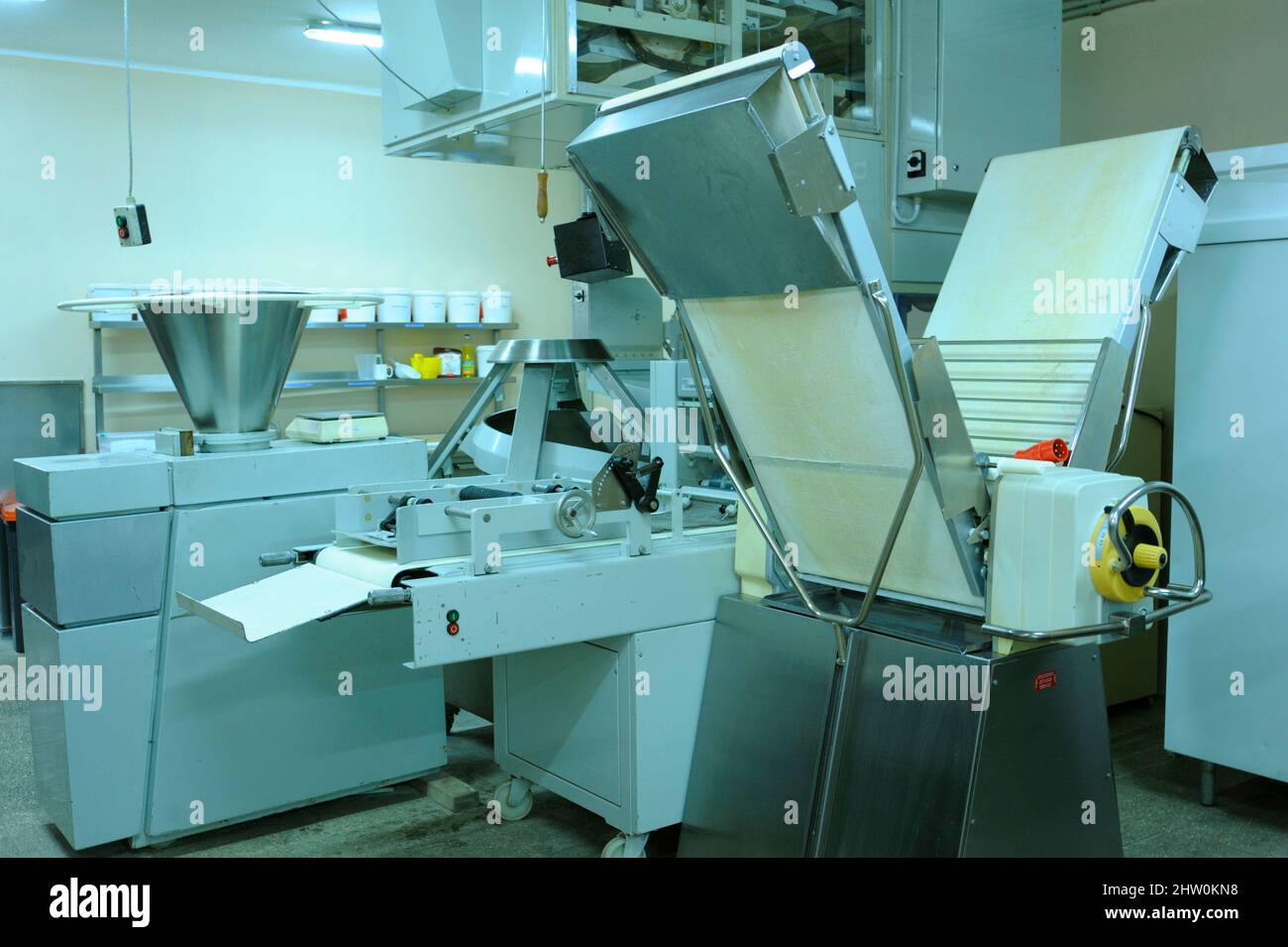 An automatic production dough line prepared for work at the bakery ...