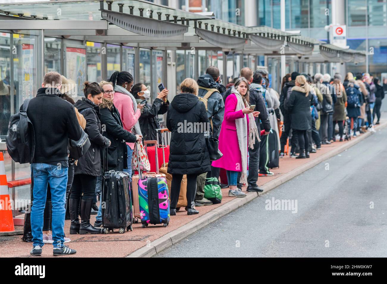 London, UK. 3rd Mar, 2022. Long queues for buses at Victoria mid ...