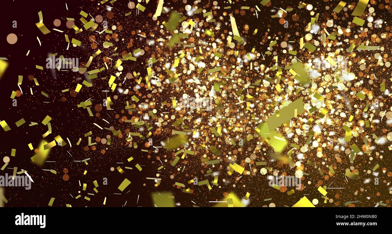 Image of golden confetti falling and light spots on black background ...