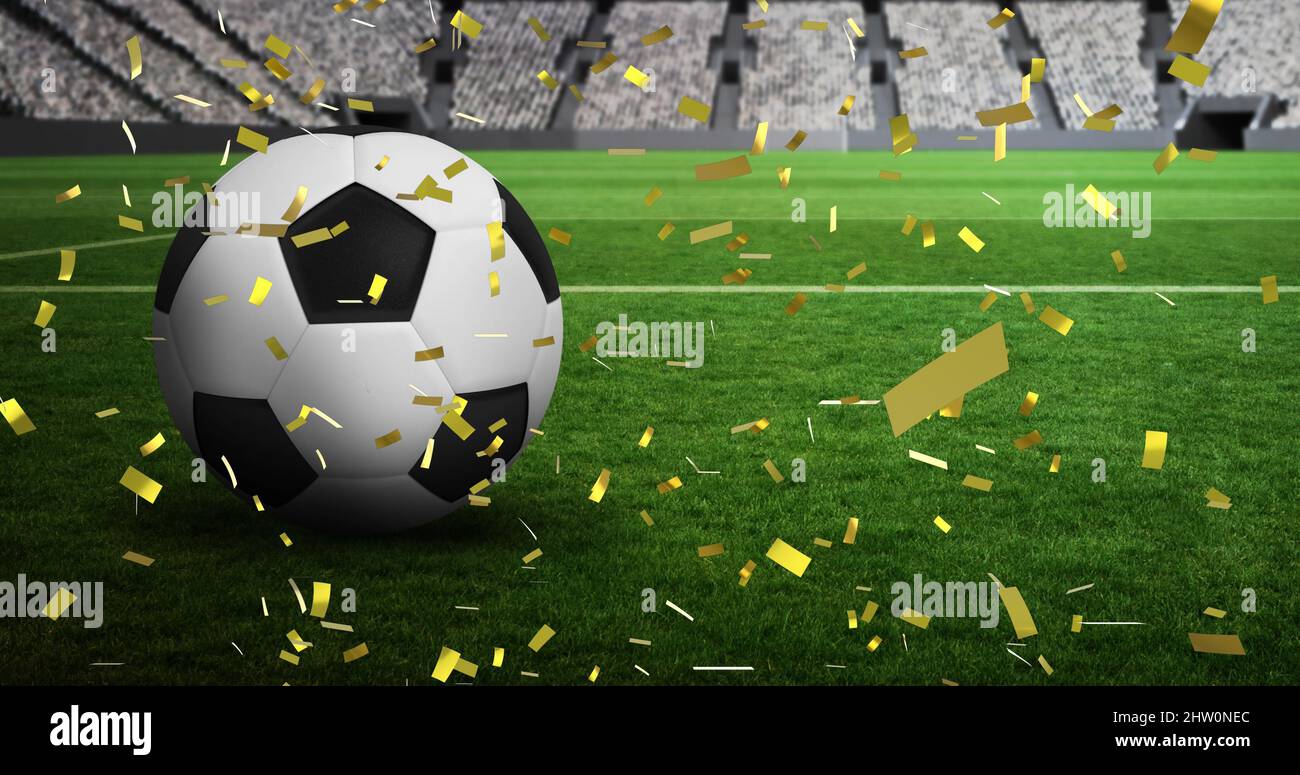 Image of gold confetti falling over football in sports stadium Stock ...