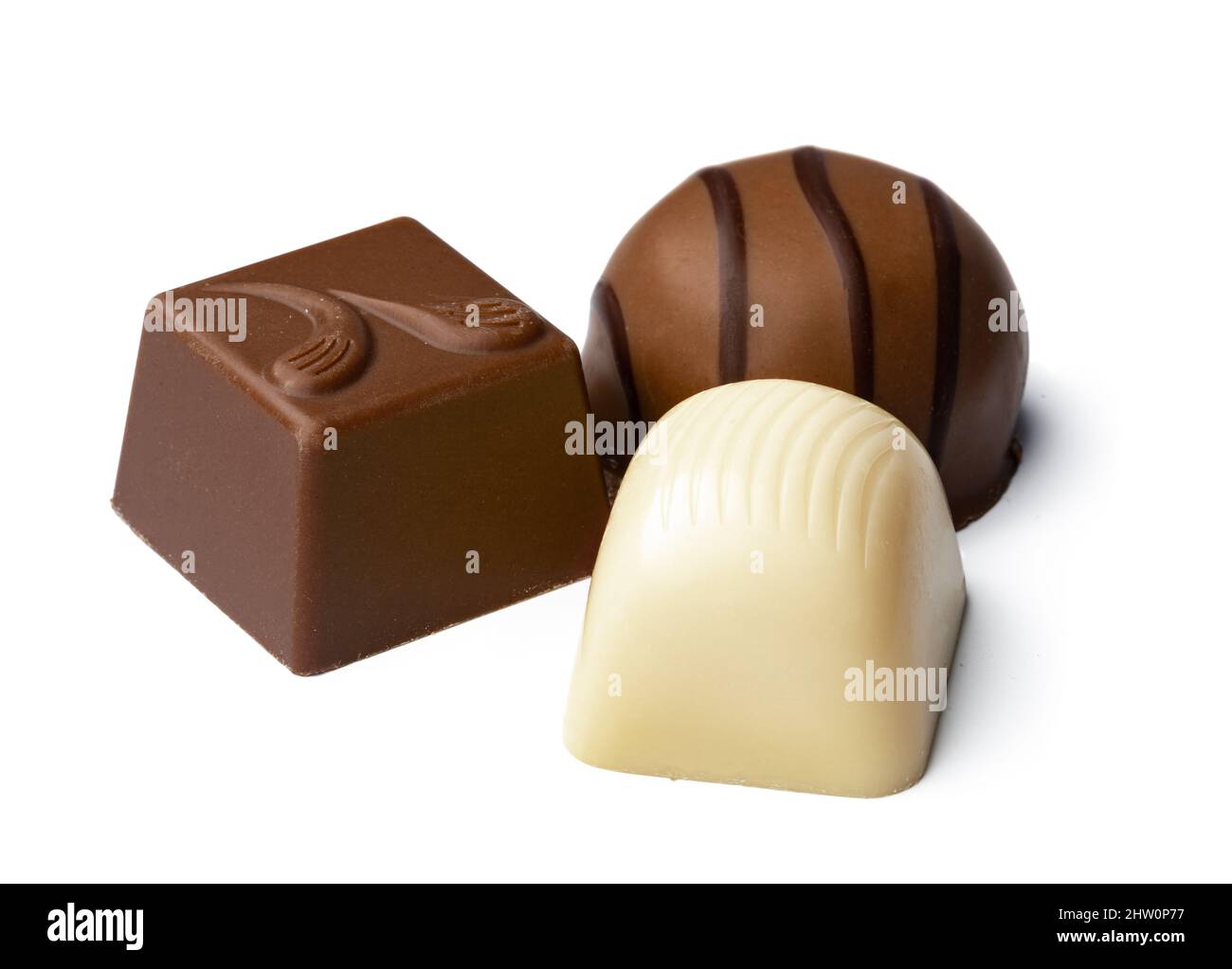 Chocolate sweets on a white background Stock Photo - Alamy