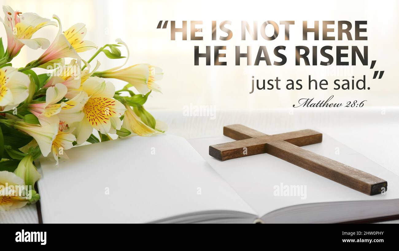 Holy Bible with cross and flowers on light background Stock Photo - Alamy