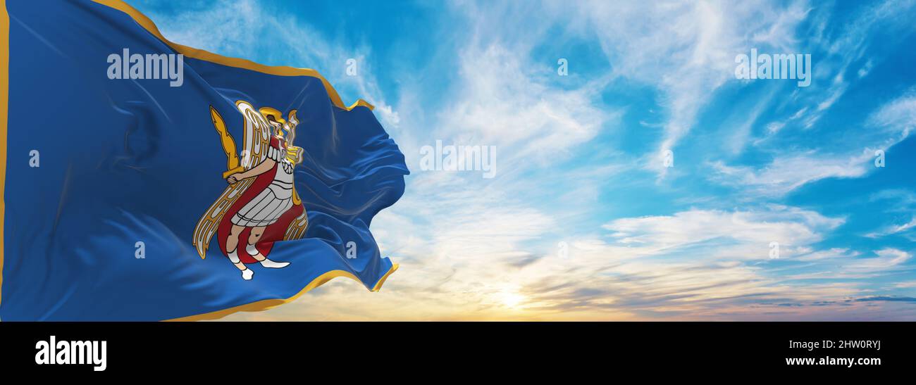 flag of Kyiv Kurovskyi , Ukraine at cloudy sky background on sunset ...