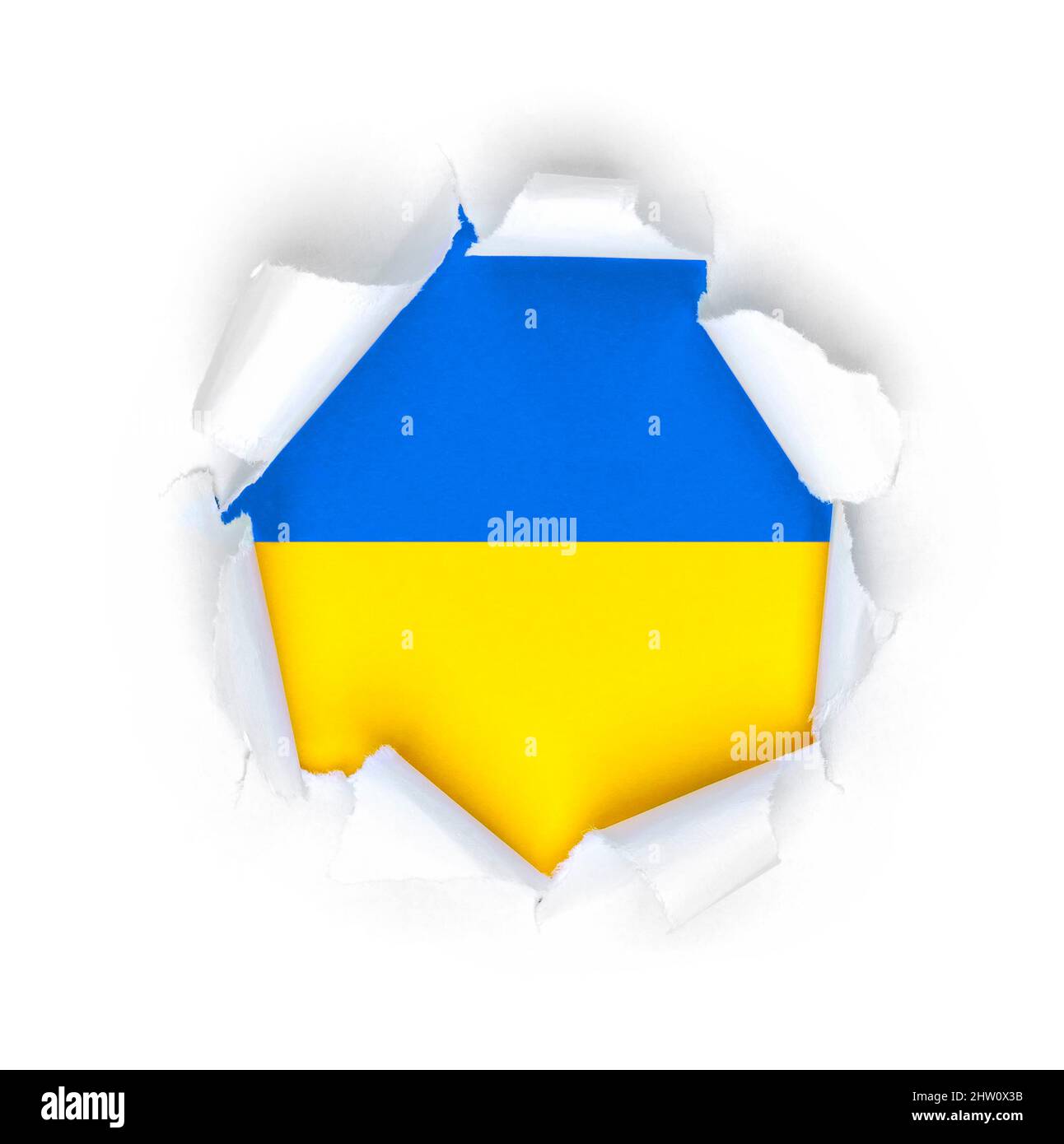 View of the Ukrainian flag through the big breakthrough in the paper ...