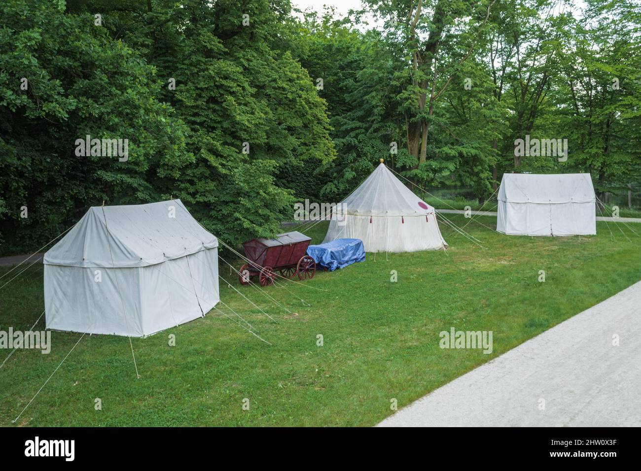 Vintage medieval wagons with food and tents on the background of the ...