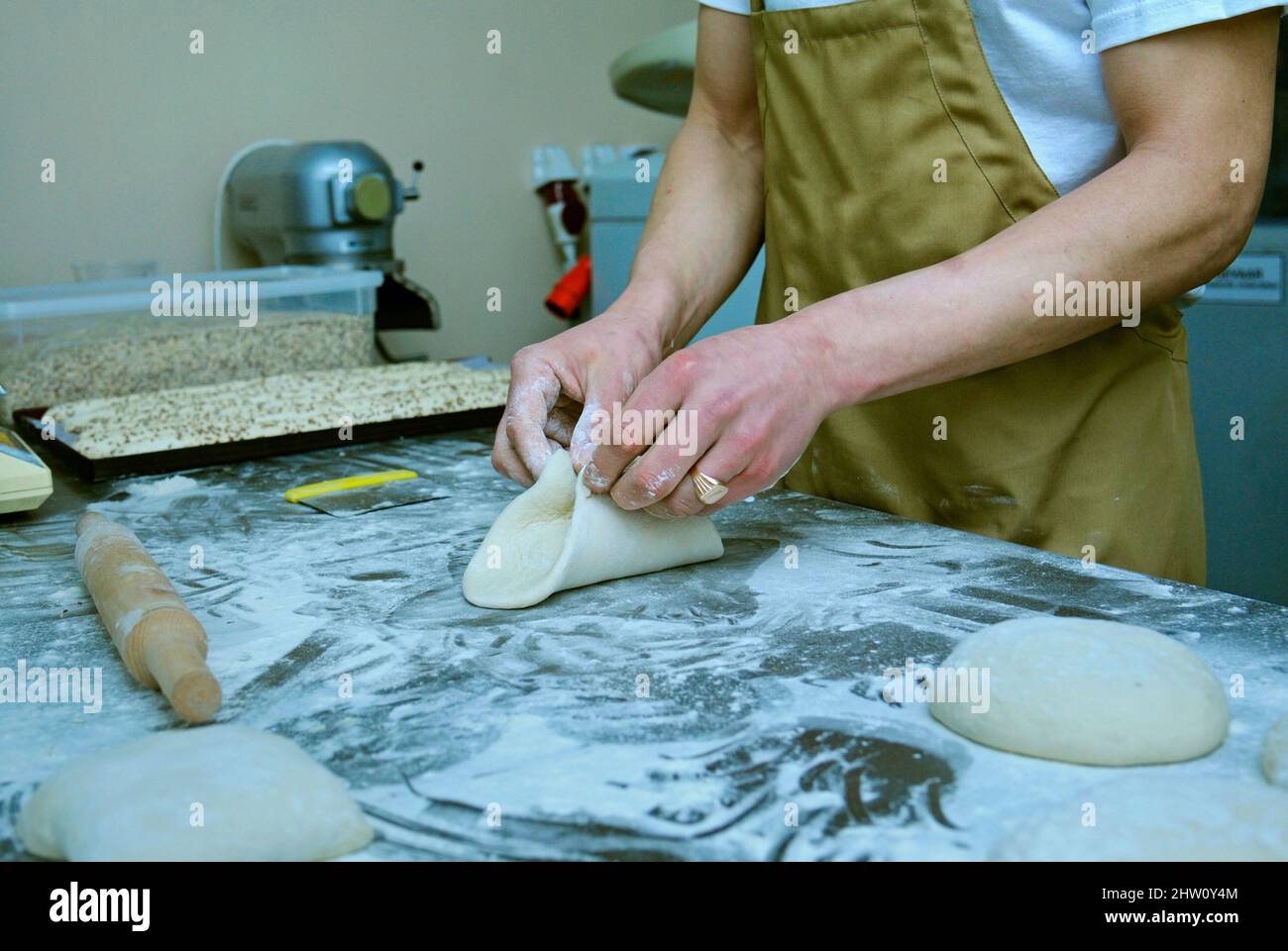 Man molding bread hi-res stock photography and images - Alamy