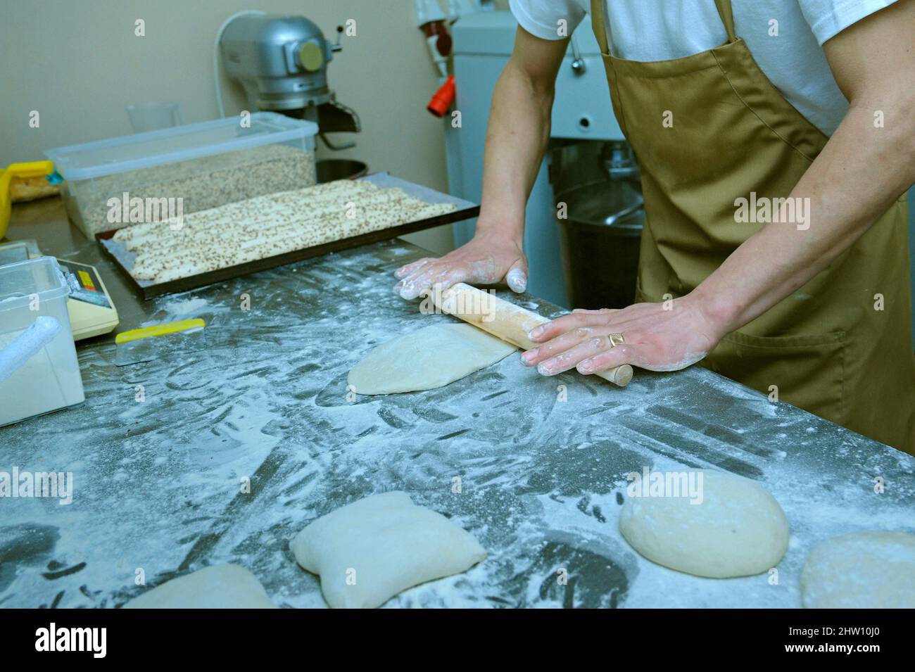 Man molding bread hi-res stock photography and images - Alamy