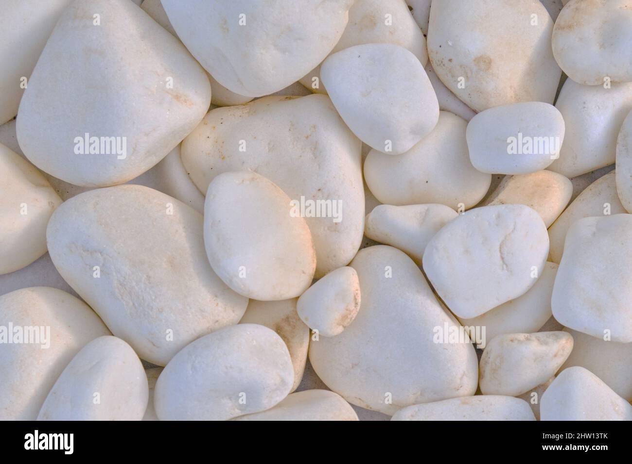 Background of large white stones. Rounded stone texture. Texture in the ...