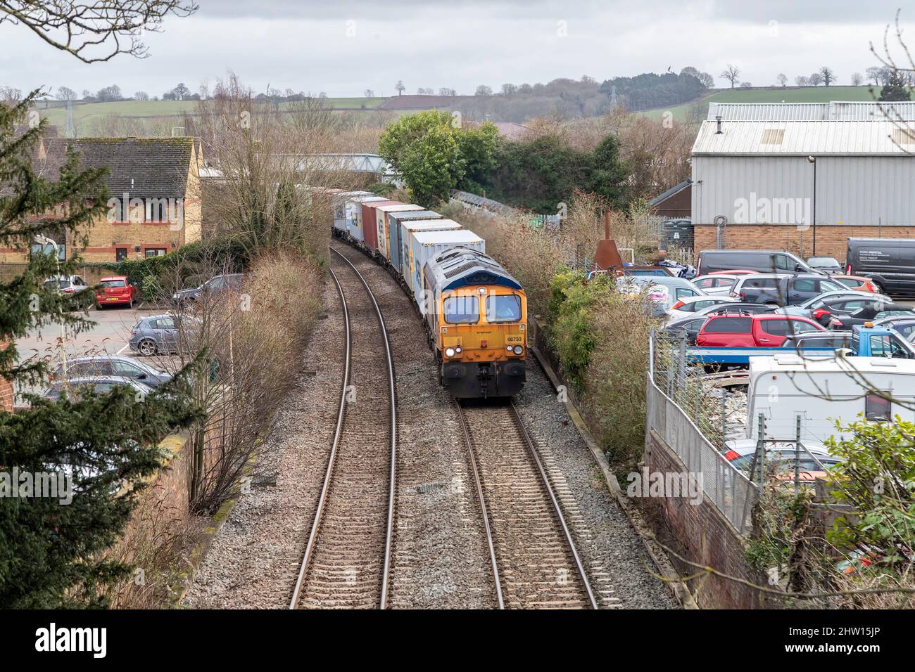 Diesel Electric Locamotive 66733 pulling container train approching ...