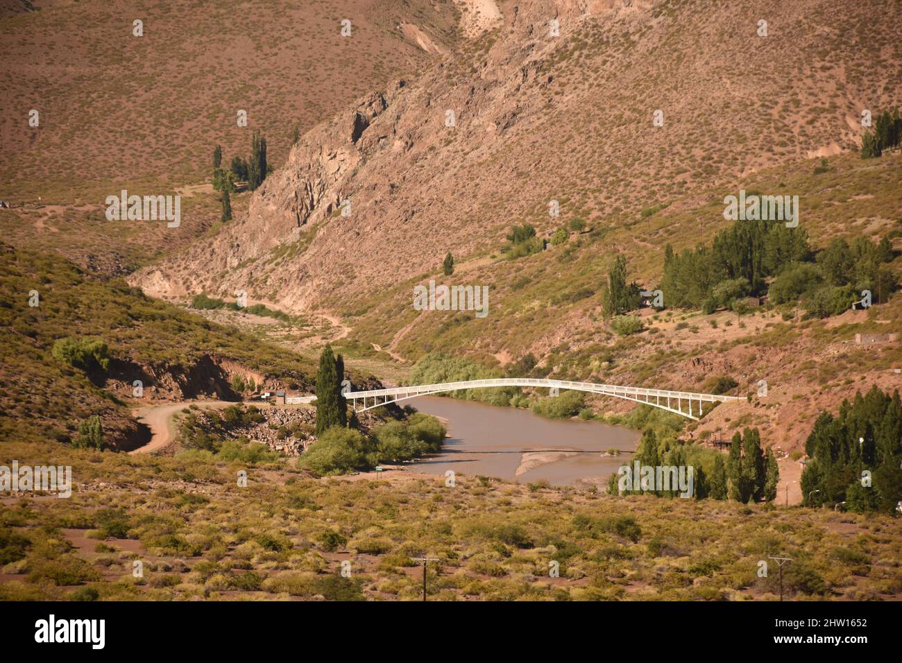 Beautiful landscape with mountains and the white bridge crossing the ...