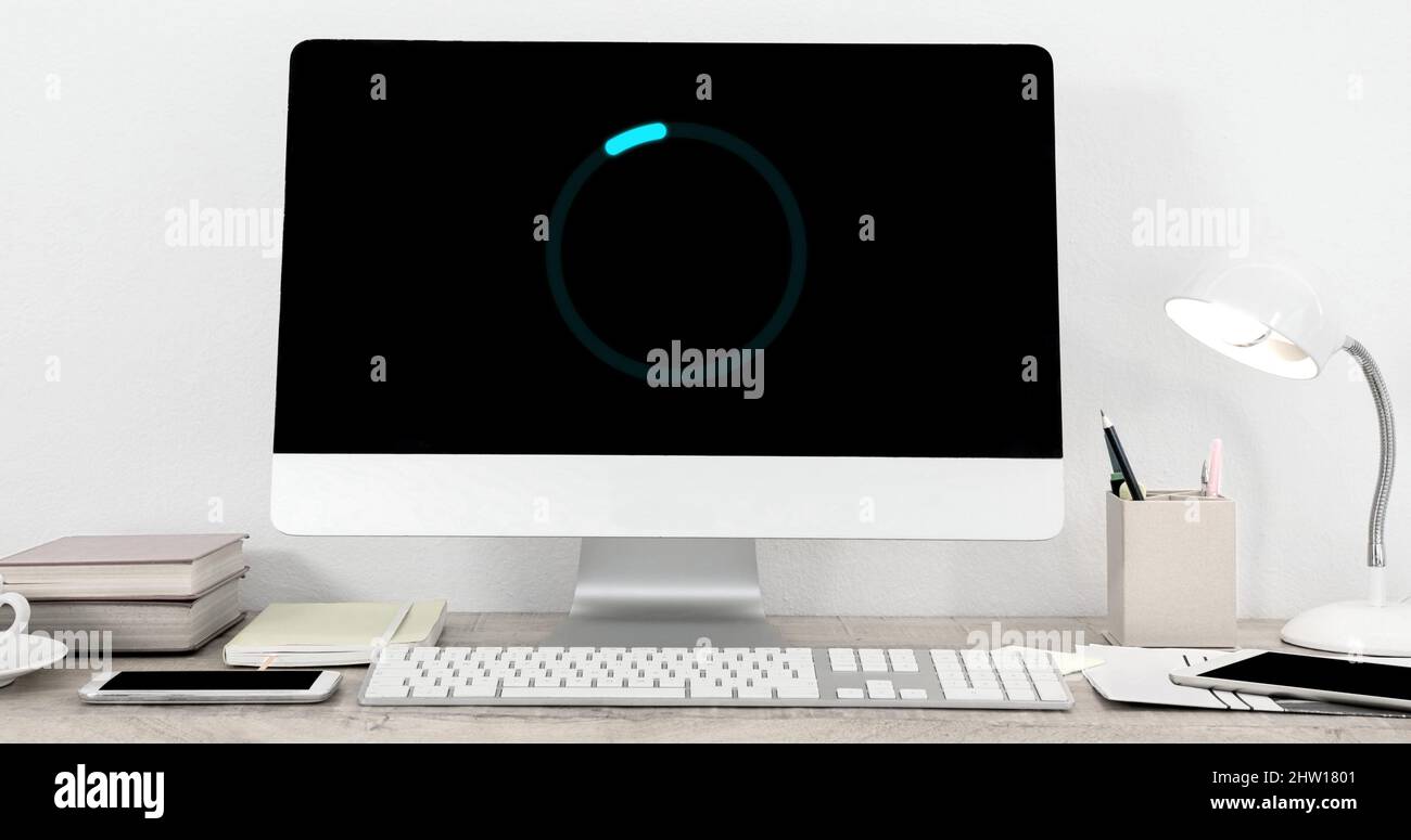 Image of loading circle on computer in office Stock Photo - Alamy