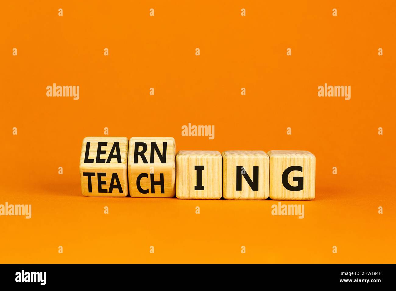 Learning or teaching symbol. Turned wooden cubes and changed the word ...