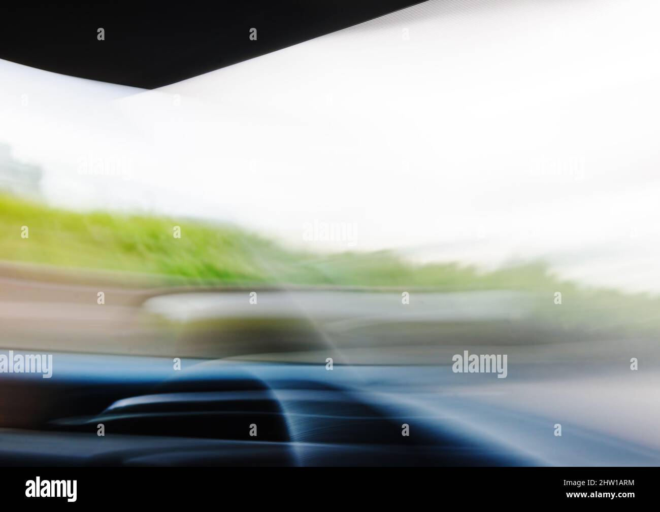 Defocused blurred lines view from inside a car in motion Stock Photo ...