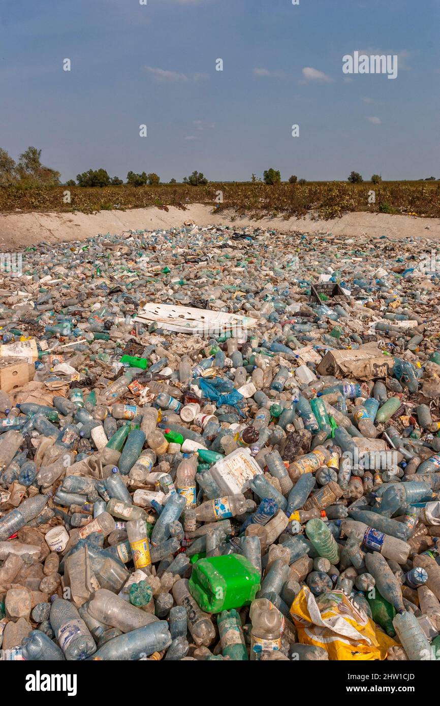 Romania, Danube Delta, unloading of plastic bottles before burial Stock ...