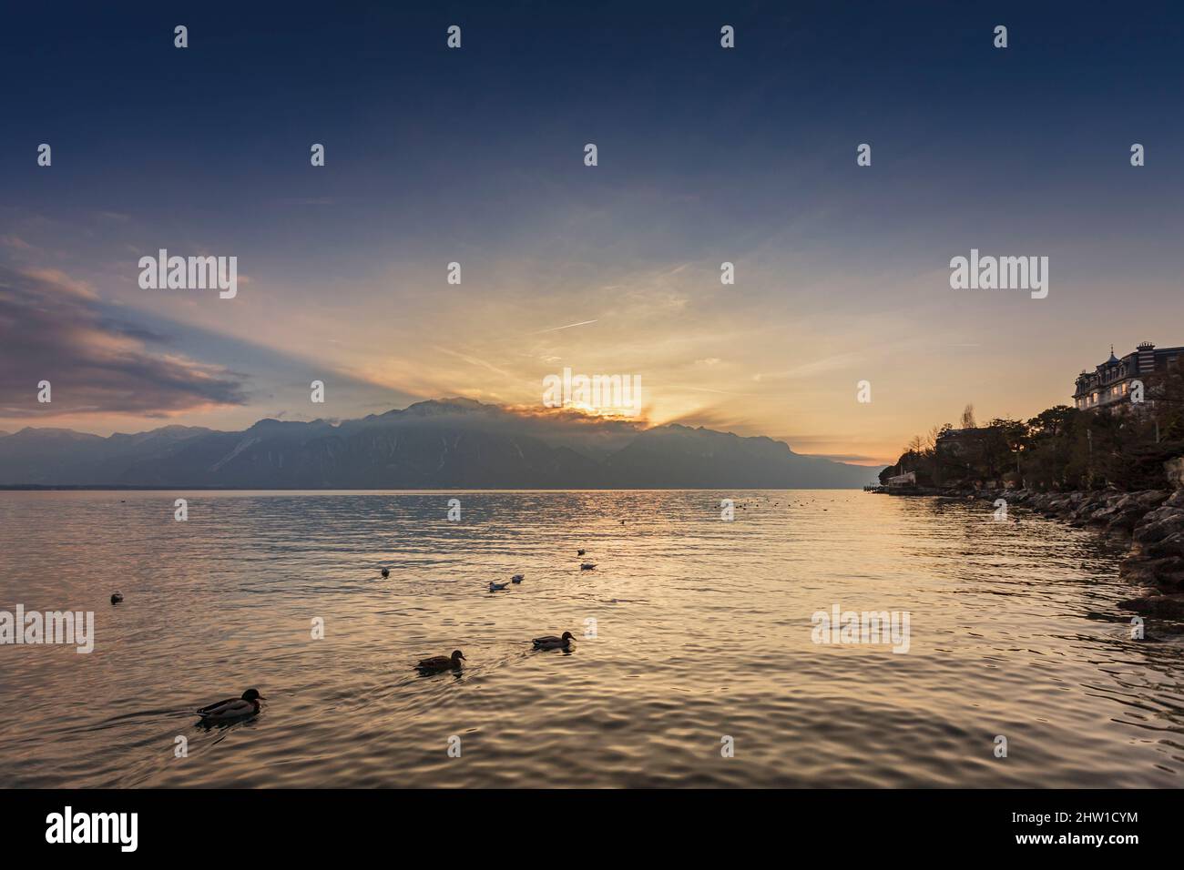 Switzerland, Canton of Vaud, Montreux, sunset over Lake Leman, also ...