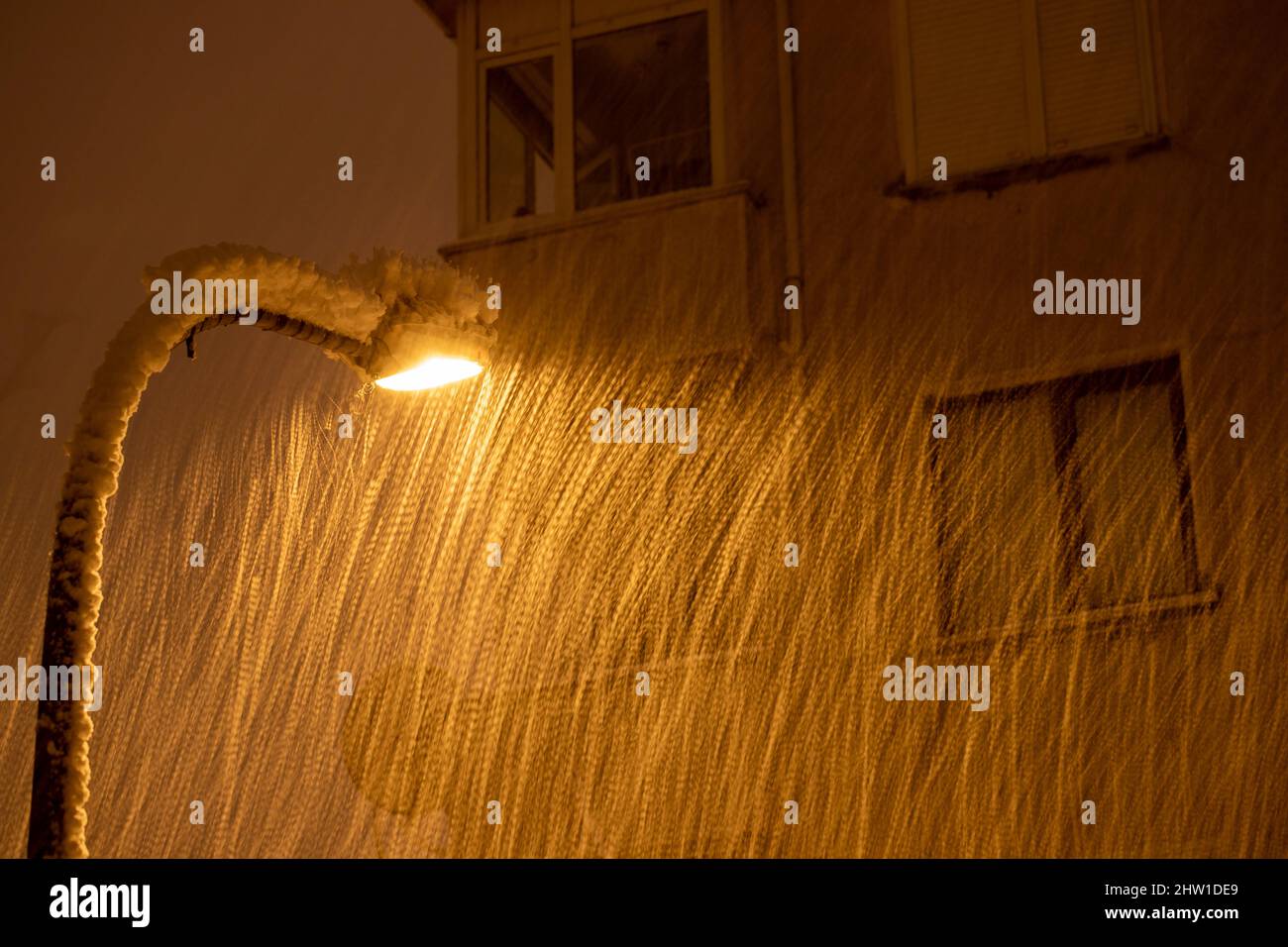 Falling snow in dark street hi-res stock photography and images - Alamy