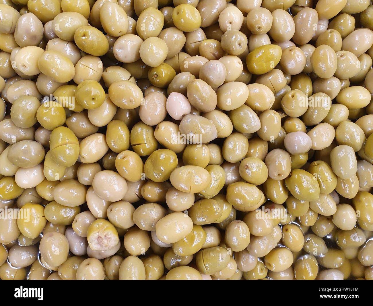 Green and organic olive varieties in the market Stock Photo - Alamy