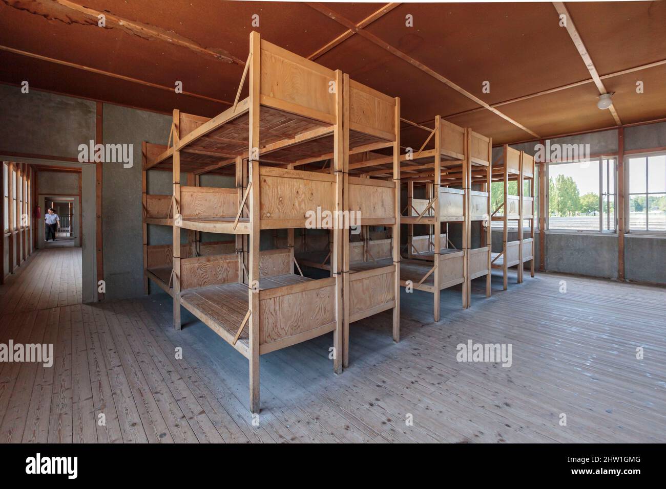 dormitory of wooden bunk beds, reconstructed shack where deportees ...