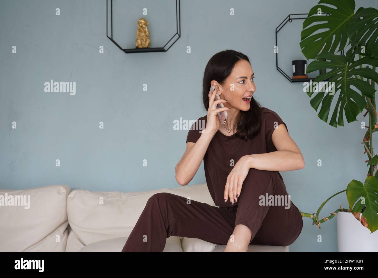 Student talking into phone on speaker hi-res stock photography and ...