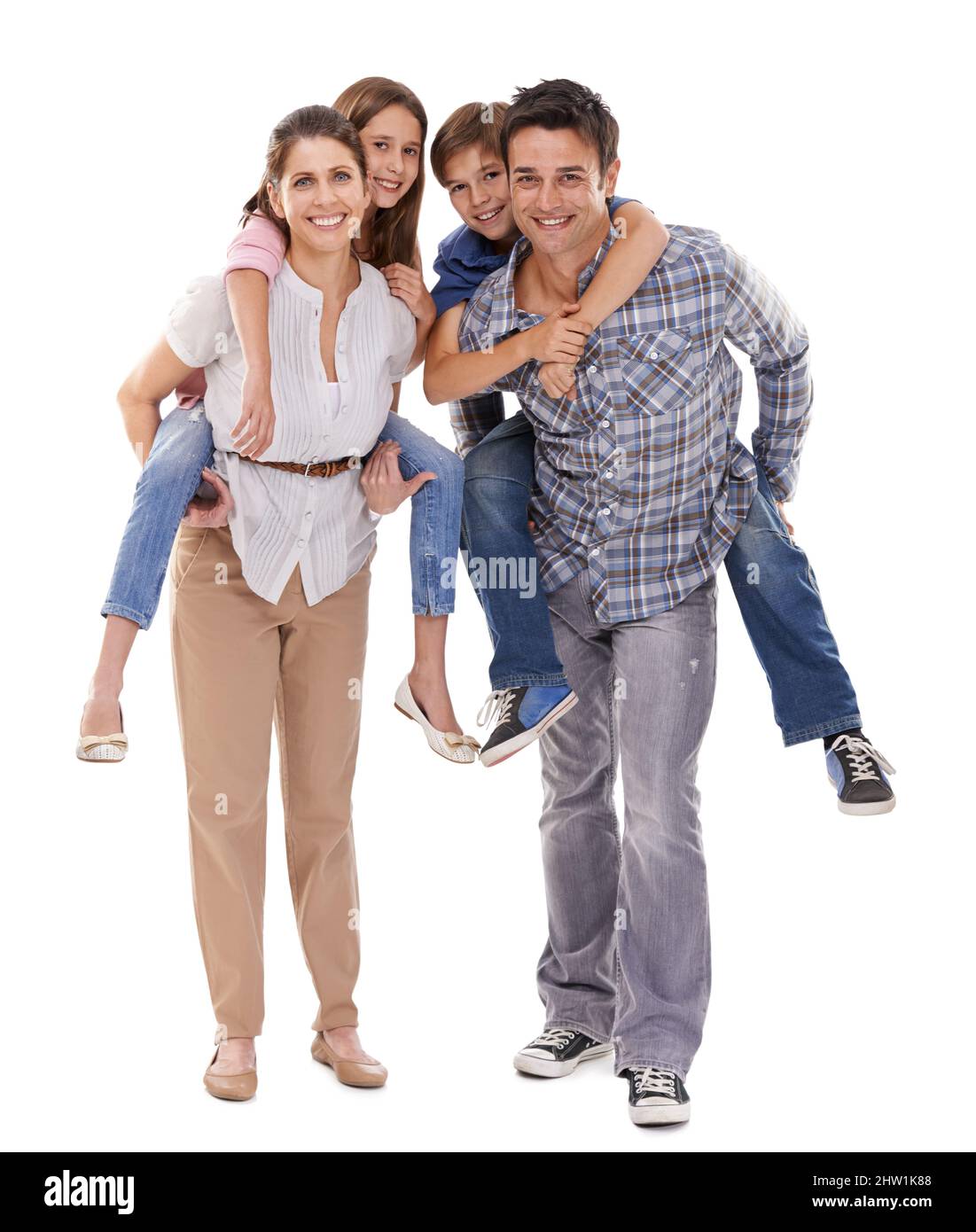 The quintessential happy family. Full-length studio portrait of a happy ...