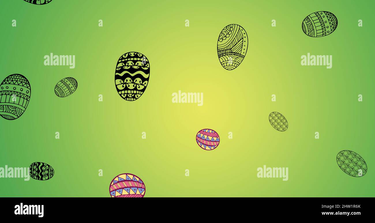 Image of easter eggs falling on green background Stock Photo - Alamy