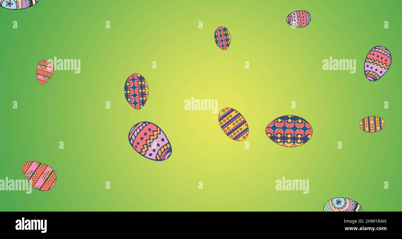 Image of easter eggs falling on green background Stock Photo - Alamy