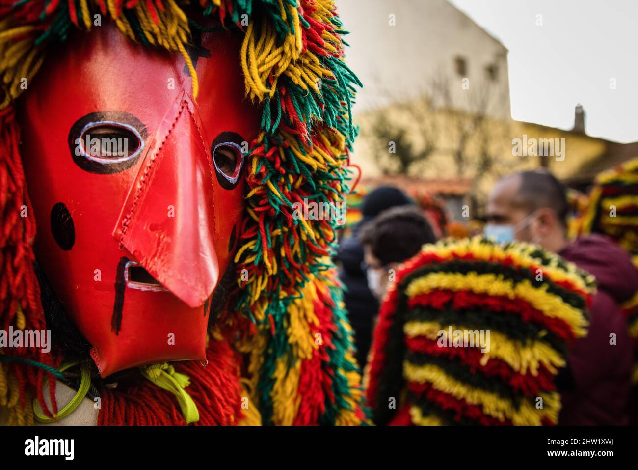 A Careto passes through the crowd before starting the parade of the ...
