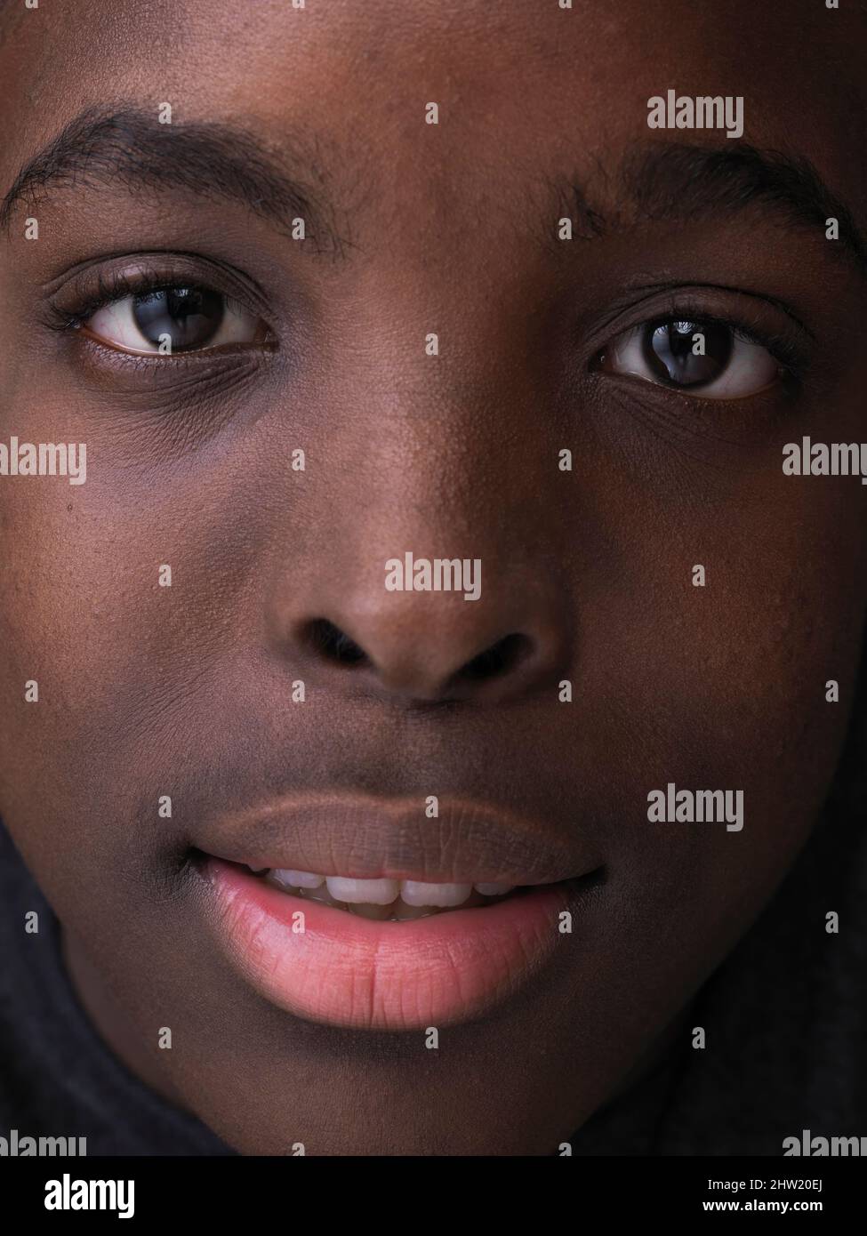 close up portrait of the face of a teenage boy Stock Photo - Alamy