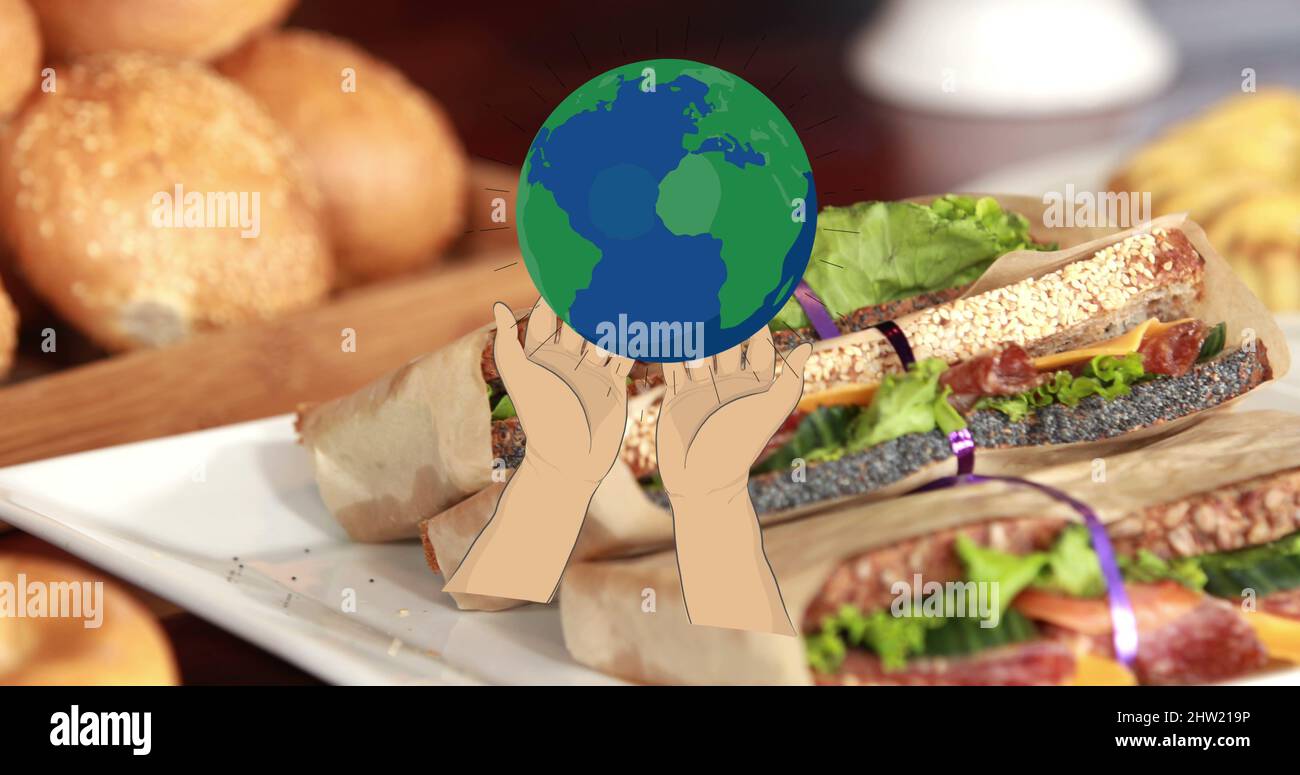 Image of planet earth and hands over fresh organic sandwiches and bread ...