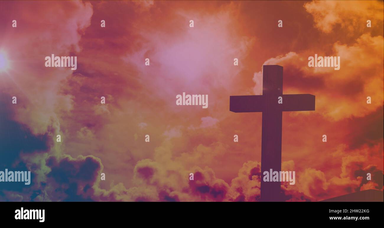 Image of lights over black crucifix shape on clouds Stock Photo - Alamy