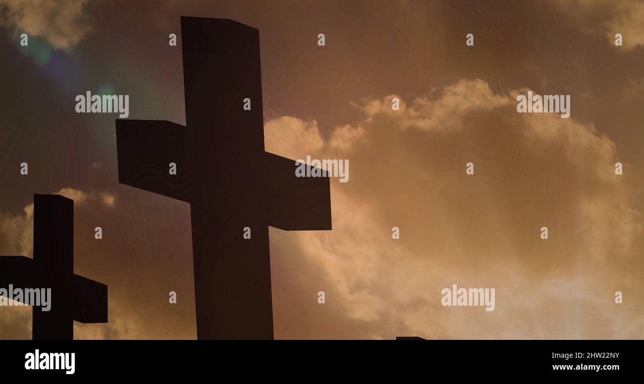 Image of lights over black crucifix shape on clouds Stock Photo - Alamy
