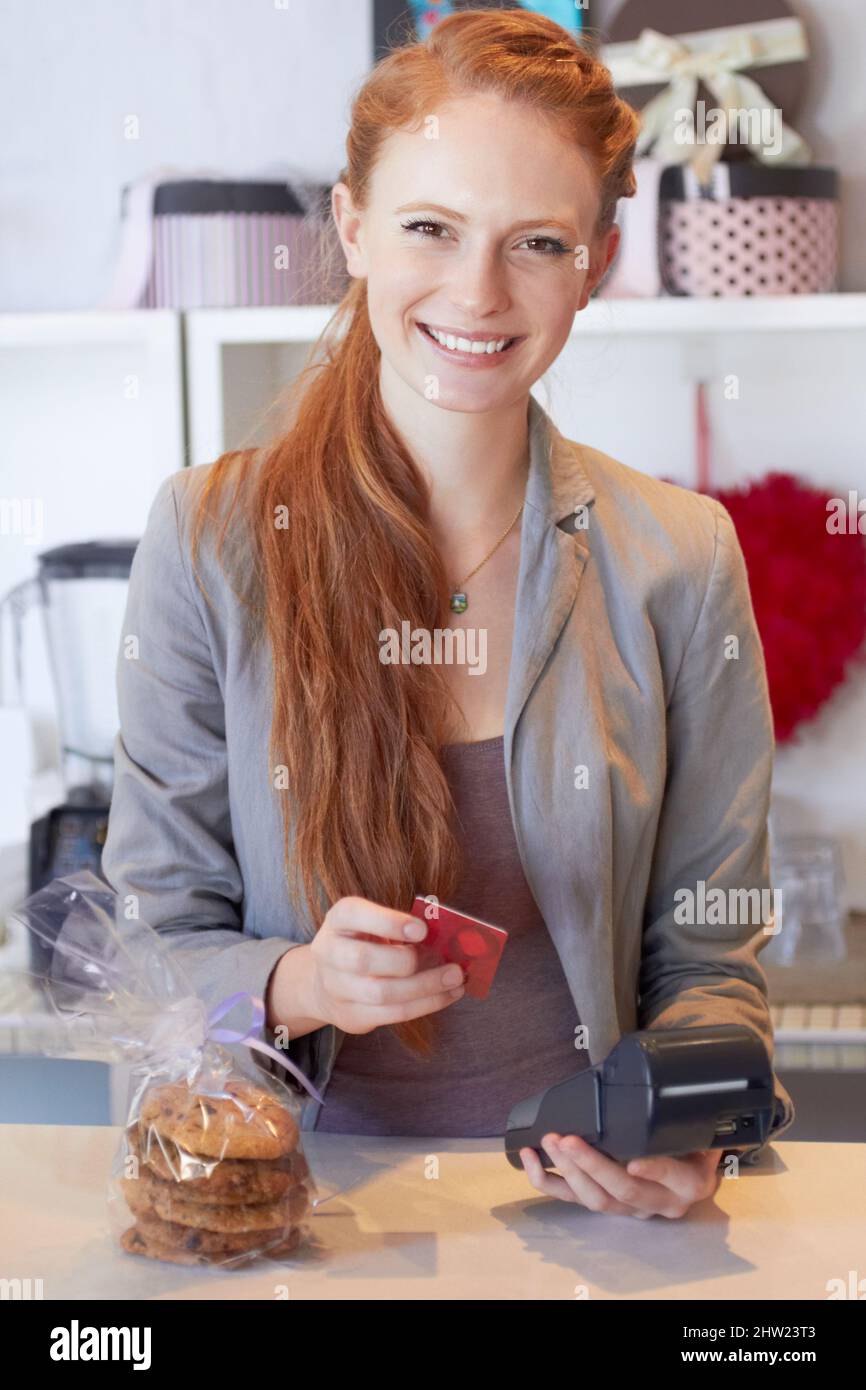 Thank you, please come again.... Portrait of an attractive young woman ...