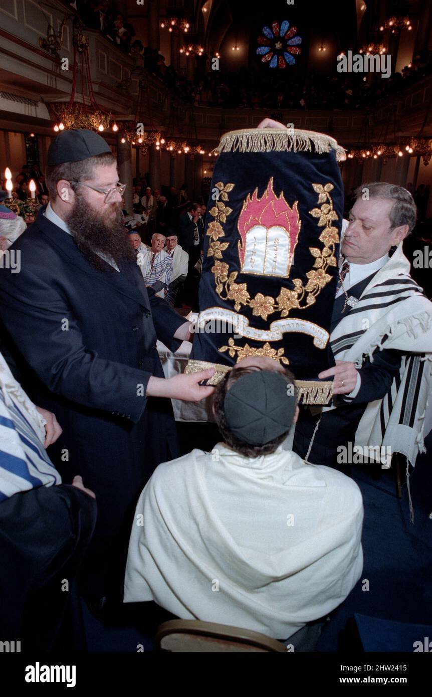 The new Sefer Torah is carried around the synagogue for the ...