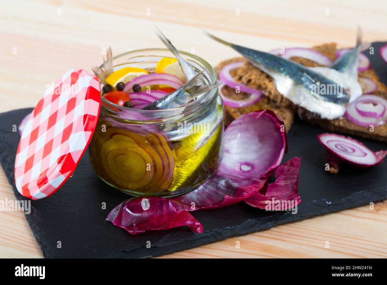 Fish dish - homemade pickling pilchards Stock Photo - Alamy