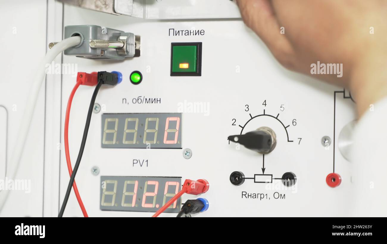 Electronic digital caliper on white dashboard. Industrial background ...