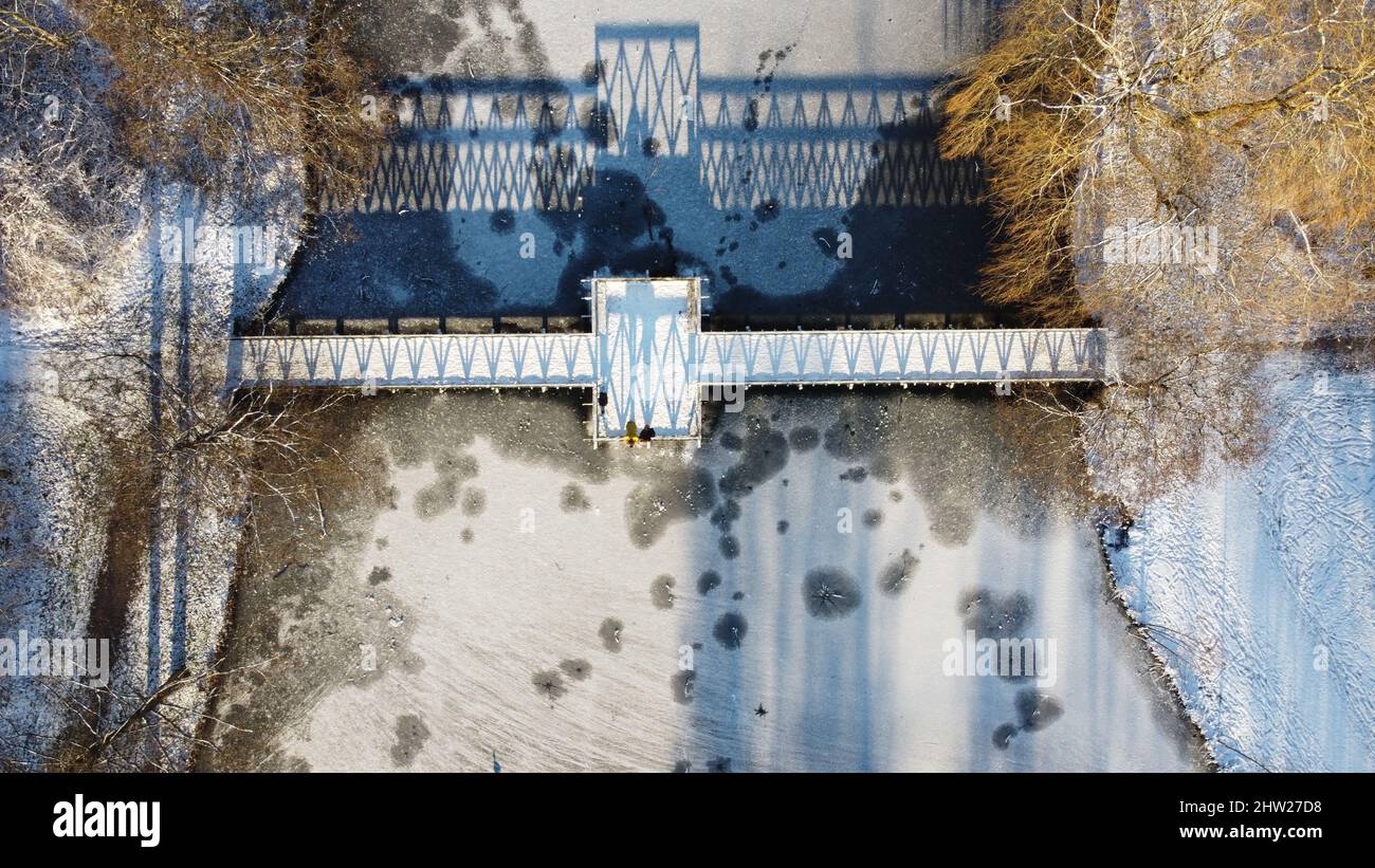 Aerial view of an iron bridge covered with snow Stock Photo - Alamy