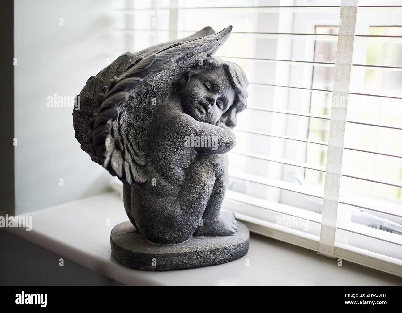 Decorative little statue of an angel Stock Photo - Alamy