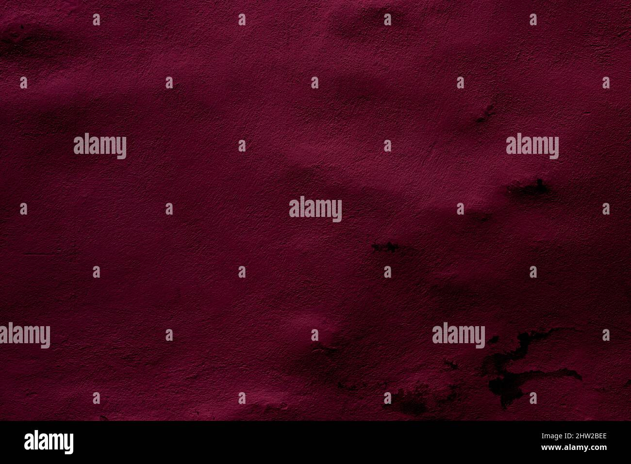 Crimson colored wall background with textures of different shades of ...