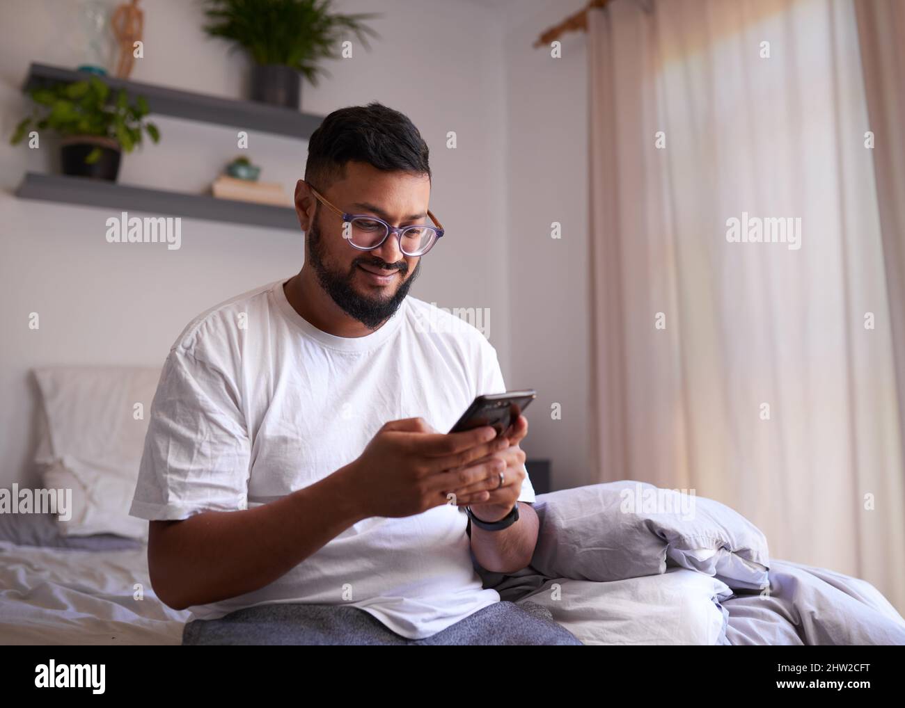Mobile phone morning routine hi-res stock photography and images - Alamy