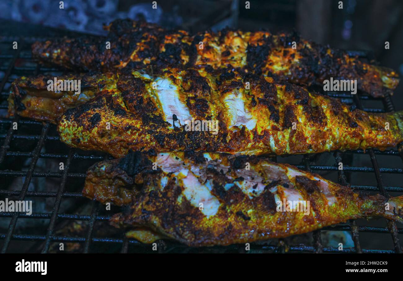Fish on the grill, Close up of seafood grilled fish food with salt on ...