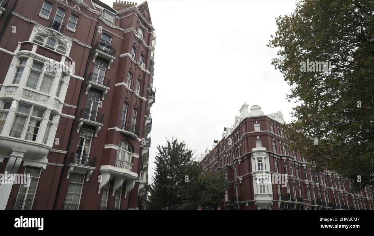 A typical London red brick building, England, bottom view. City ...