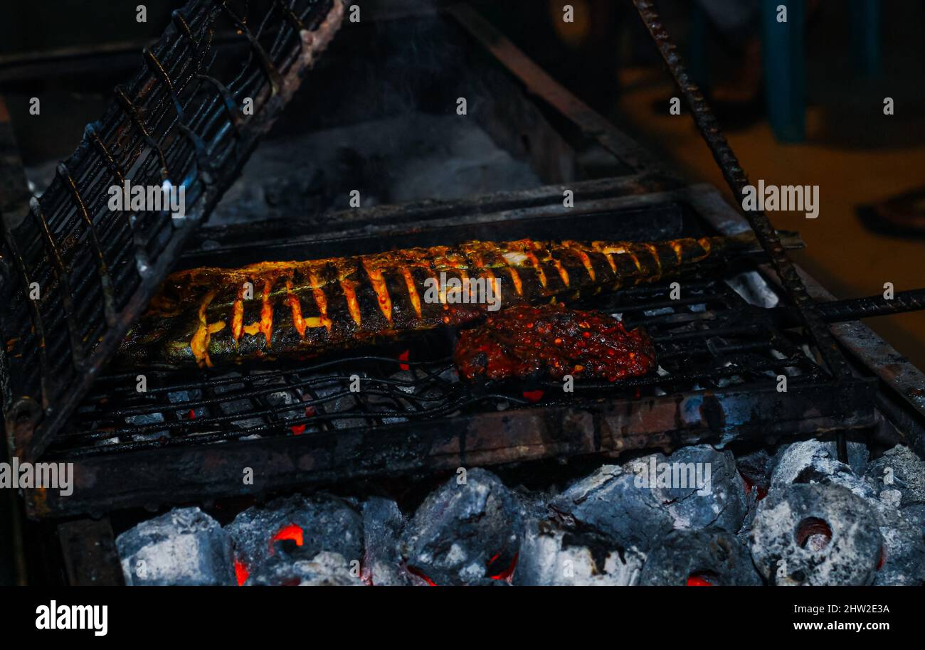 Fish on the grill, Close up of seafood grilled fish food with salt on ...