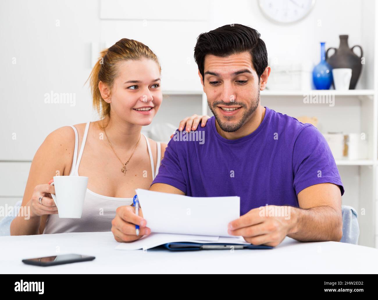 Portrait happy couple reading letter hi-res stock photography and ...