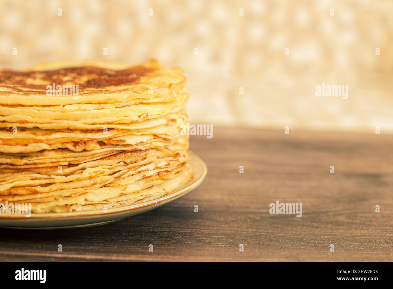 Delicious pancakes with chocolate sauce fresh blueberries on a rustic ...