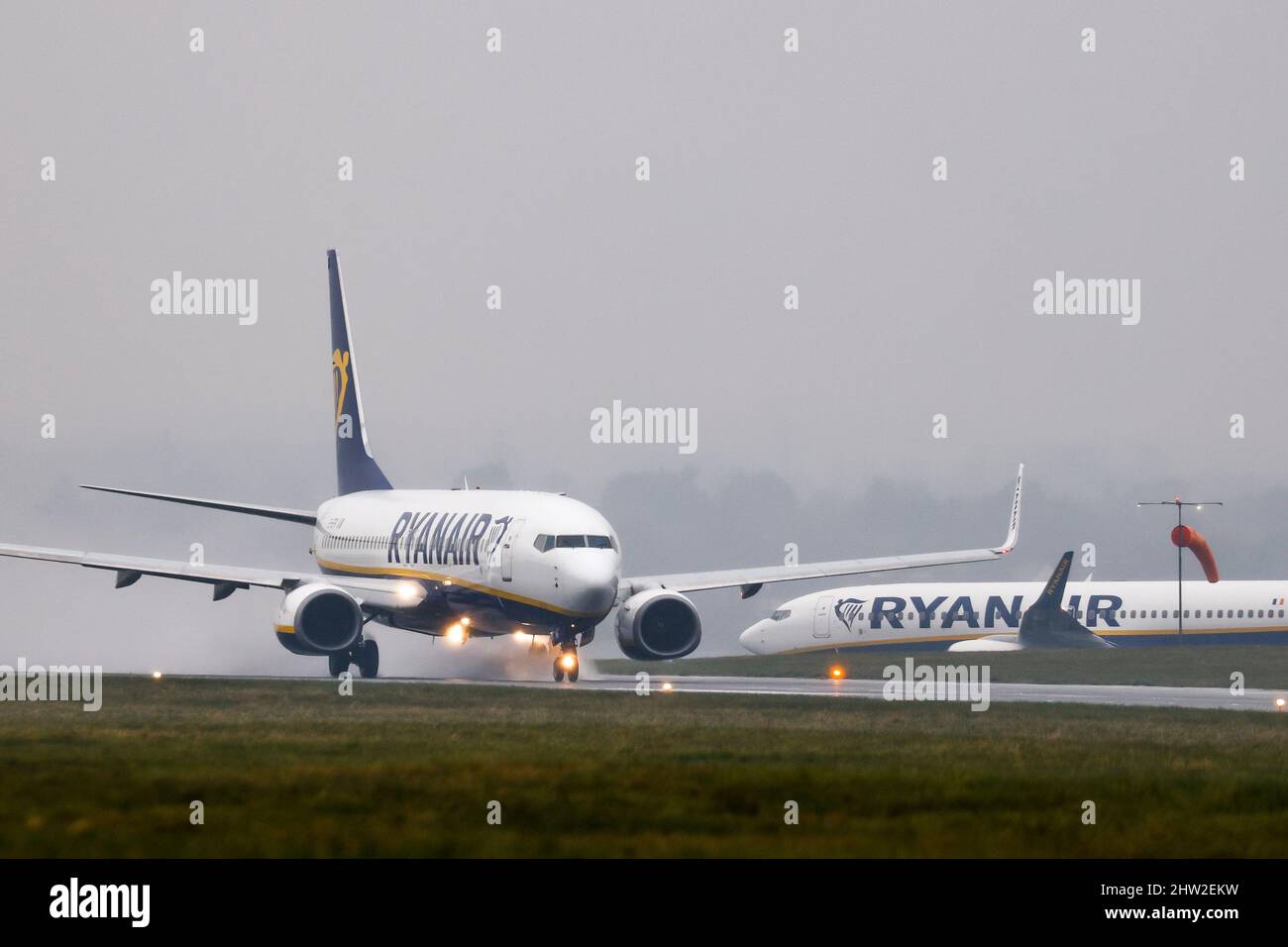 Ryanair Boeing 737 registration EI-EFK taking off from a wet runway on ...
