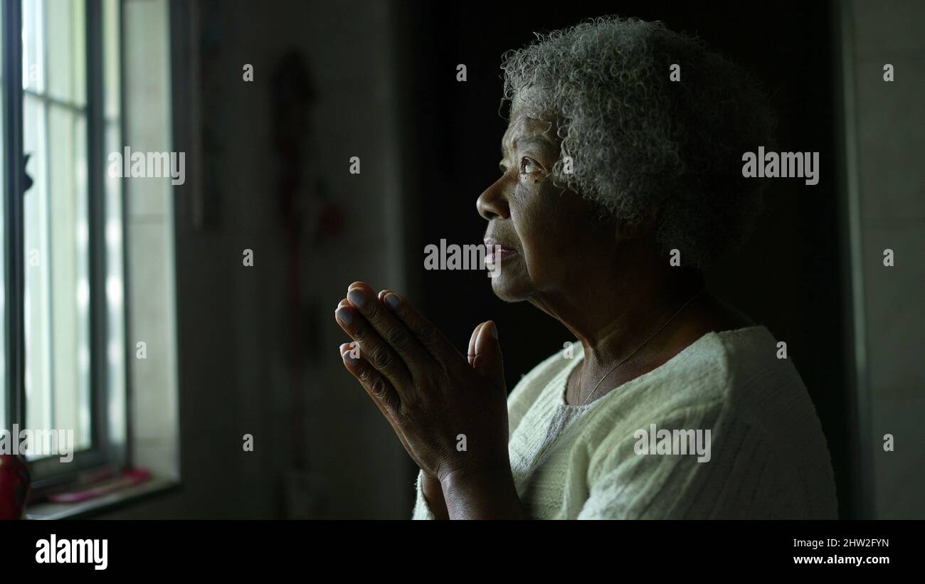 A senior African woman opening eyes with HOPE and FAITH Stock Photo - Alamy
